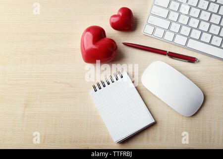 Computer peripherals with red hearts, notebook and mobile phone on ...
