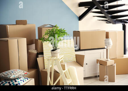 Packed household goods for moving into new house Stock Photo - Alamy