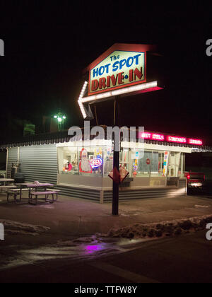 The Hot Spot Drive In at night Stock Photo - Alamy