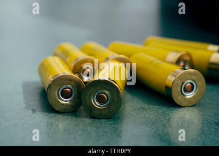 Close-up of the shotgun shells on the ground Stock Photo - Alamy