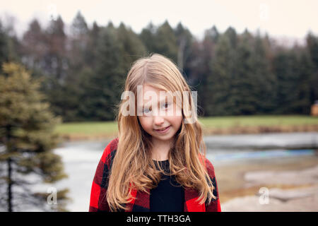 Pretty girl in plaid red clothing isolated on white Stock Photo - Alamy