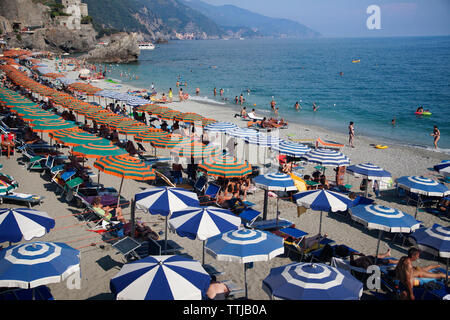 High angle view of people enjoying in infinity pool Stock Photo - Alamy