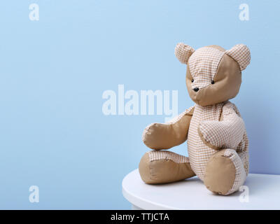 Baby toy on the table, light background Stock Photo - Alamy