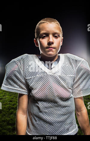 American Football Player against view of spotlights Stock Photo - Alamy