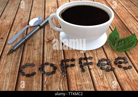 Coffee bean and coffee cup, pen and spoon on wooden table. 3D rendering ...