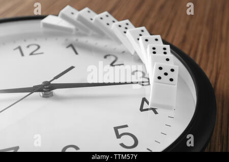Dominoes on Clock Stock Photo - Alamy