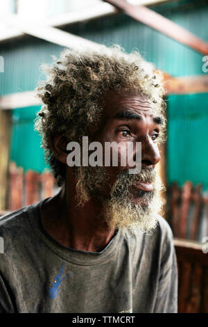 BELIZE, Belize City, portrait of a local man Michael E. Cain at Bar ...