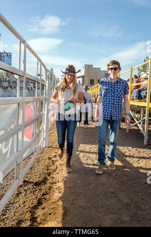 USA, Oregon, Sisters, Sisters Rodeo, spectators watch the events of the ...