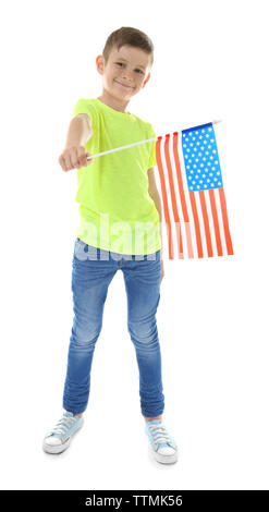 Patriotic schoolboy holding an American flag, ready for school Stock ...