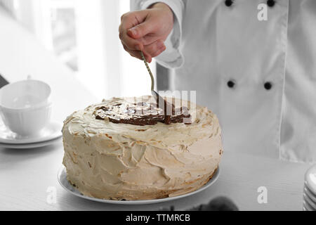 female chef making caramel Stock Photo - Alamy