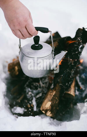 camping - kettle over campfire Stock Photo - Alamy