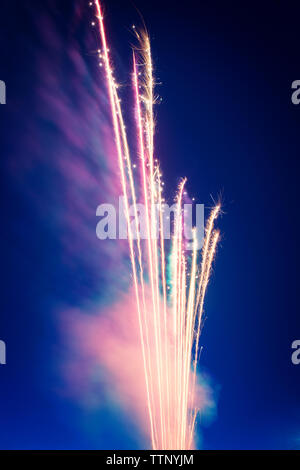 Low Angle View of firework display against black sky Stock Photo - Alamy