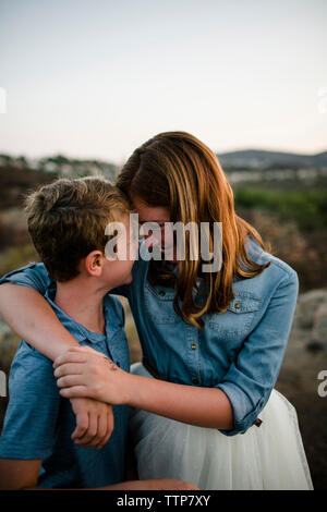 Boy and girl with foreheads touching Stock Photo - Alamy