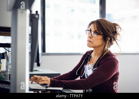 Female doctor using stethoscope to exam patient; panoramic banner Stock ...
