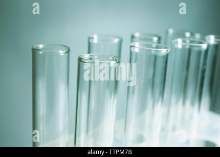 Test tubes on dark background Stock Photo - Alamy