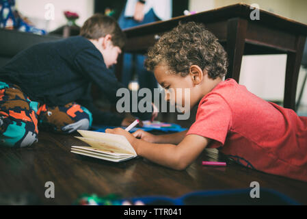brothers doing homework Stock Photo - Alamy