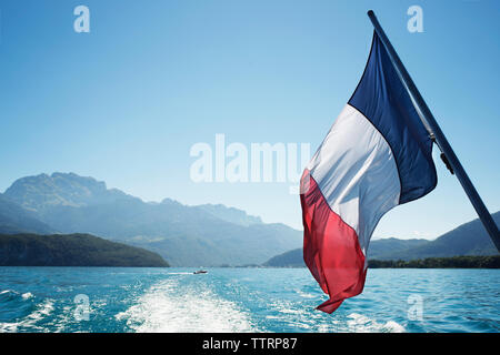 lake annecy and french flag Stock Photo - Alamy