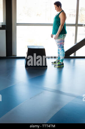 Full length fitness woman standing in sportswear Stock Photo - Alamy