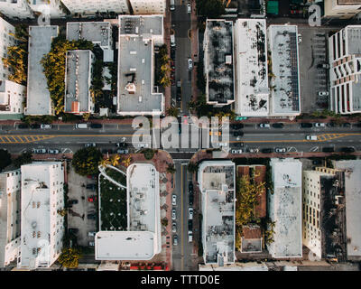 Overhead view of crowded buildings in downtown New York City with blue ...