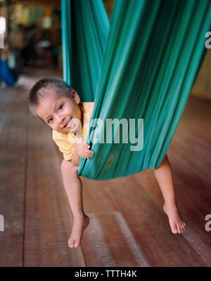 smiling boy inside a center Stock Photo - Alamy