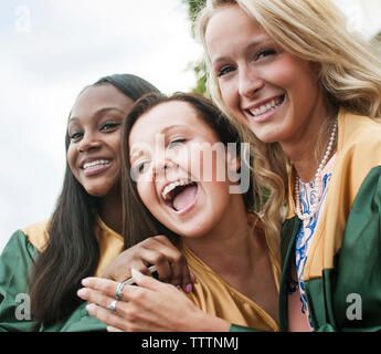 Three friends at graduation ceremony Stock Photo - Alamy