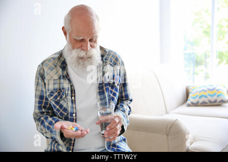 Man Taking Pills Stock Photo - Alamy
