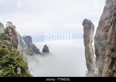 Clouds swirl around Sanqing Mountain Stock Photo - Alamy