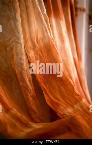 Hand stroking soft silk and fabric Stock Photo - Alamy