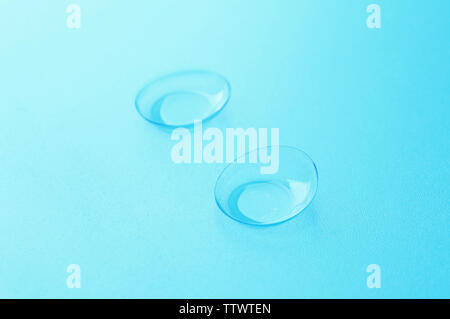 contact lenses, on blue background Stock Photo - Alamy