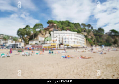 Blurred view of sandy beach near sea Stock Photo - Alamy
