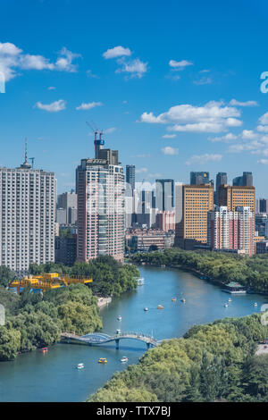 Autumn overlooking urban buildings, woods and rivers in Shenyang, China ...