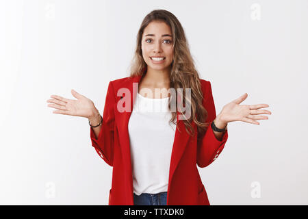 Clumsy and awkward silly young woman in glasses acting unaware and ...