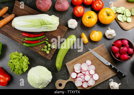 Fresh zucchini on black textured background Stock Photo - Alamy