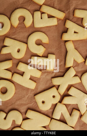 Cookie alphabet on crumpled paper, closeup Stock Photo - Alamy
