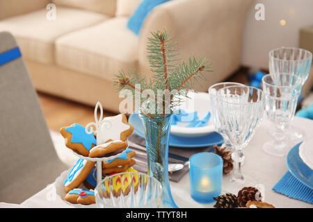 Table setting for Hanukkah celebration, closeup Stock Photo - Alamy