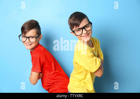 Twin brothers in glasses on white background Stock Photo - Alamy
