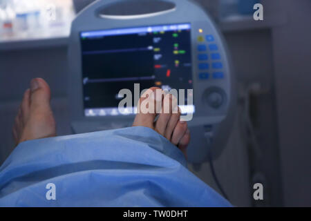 Feet of patient in operating room Stock Photo - Alamy