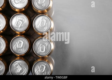 Cans of beer on gray table, top view Stock Photo - Alamy