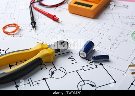 Different electrical tools on paper circuit drawing background Stock ...