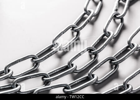 Detailed closeup lots of silver chains Stock Photo - Alamy