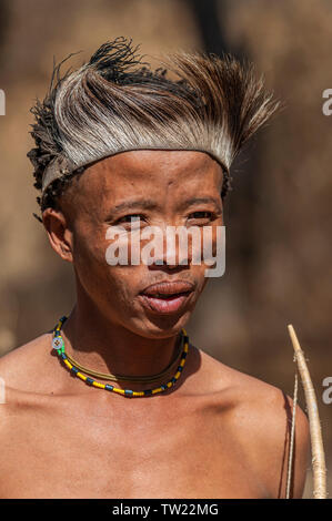 Ju/'Hoansi or San bushmen hunter at their village, Grashoek. They are ...