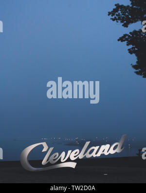 Cleveland Script Sign in Fog Stock Photo - Alamy
