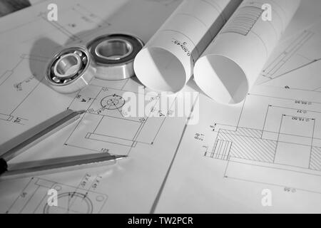 Engineering supplies and part blueprints on workplace Stock Photo - Alamy