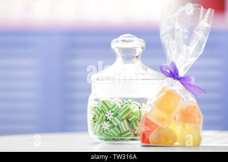 Different sweets on table at candy shop Stock Photo - Alamy