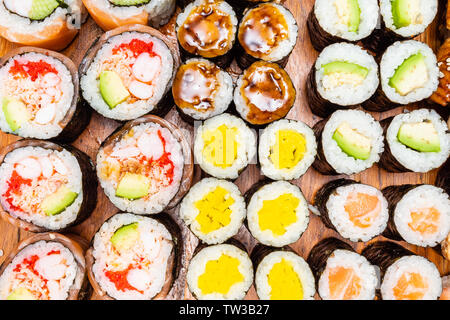 Sushi on a old wooden table background with a heart shaped decor Stock ...