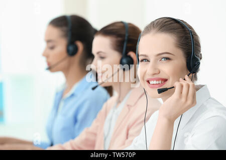 Young female technical support dispatchers working in office Stock ...