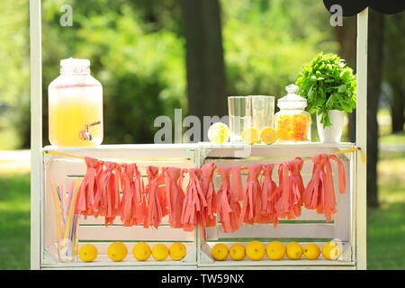 Wooden lemonade stand in park Stock Photo - Alamy