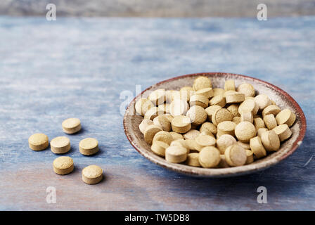 Bio Green Barley Grass tablets. Concept for a healthy dietary ...