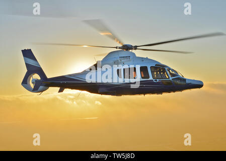 Corporate, Executive, military and law enforcement helicopter in flight ...