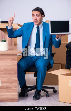 Young handsome businessman being fired from his work Stock Photo - Alamy